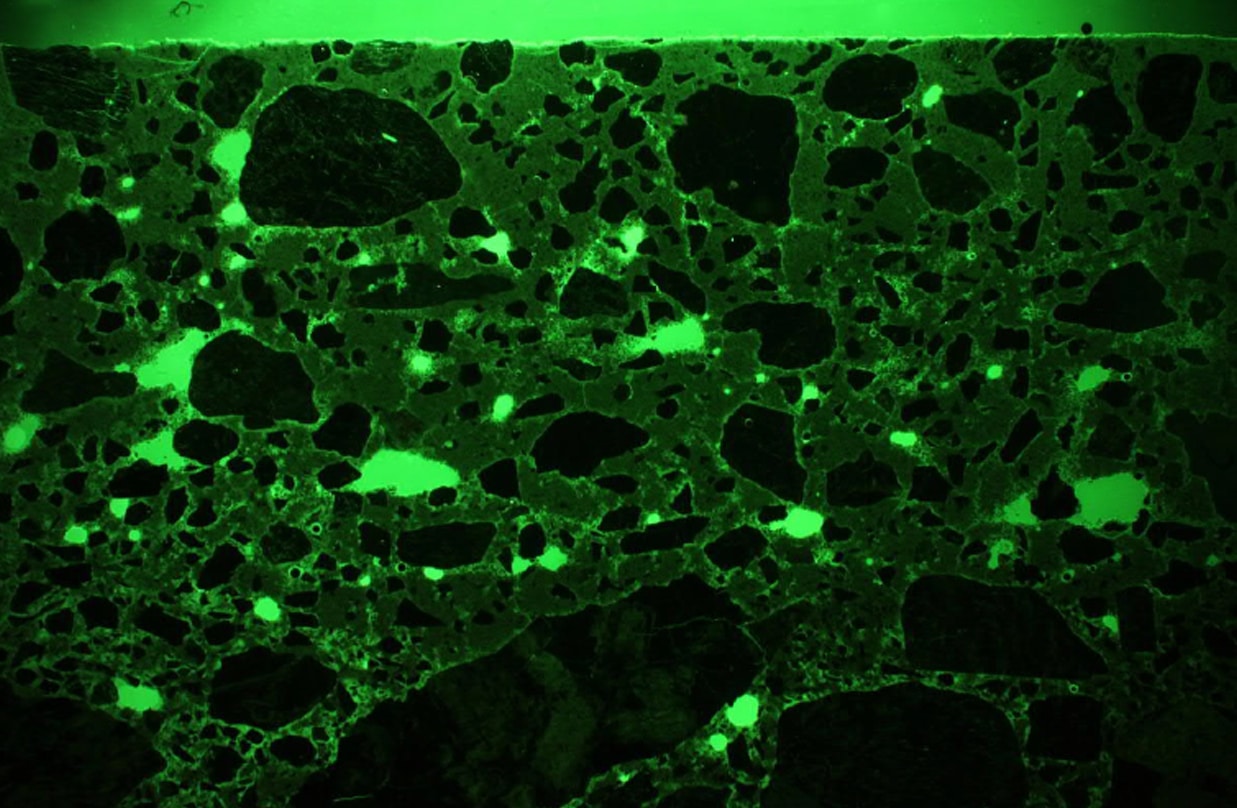 What is a concrete densifier and how does it work?